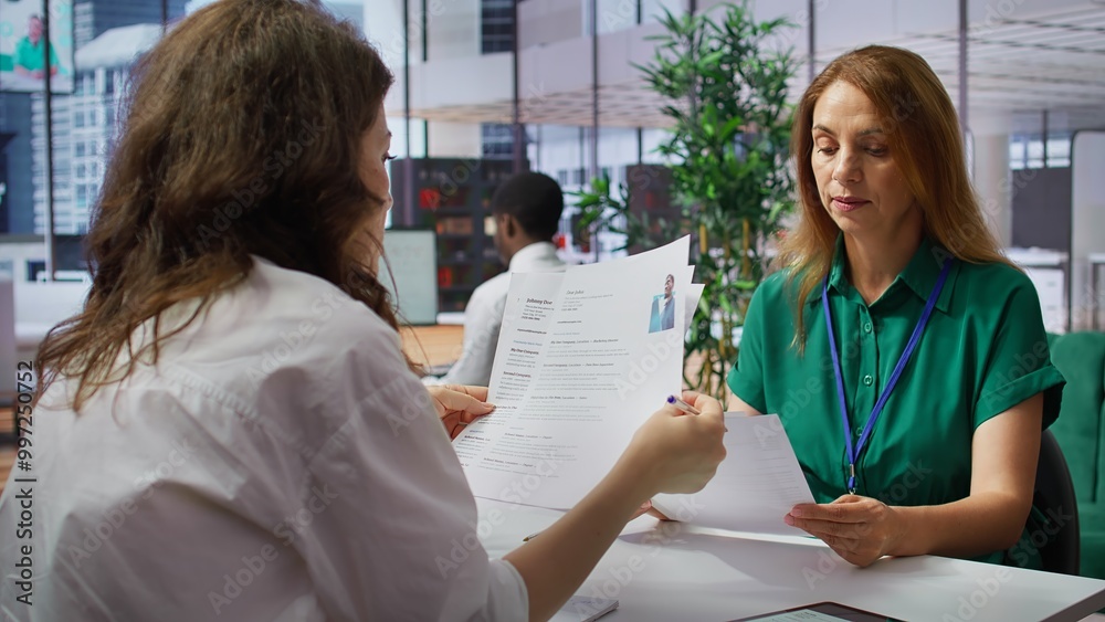 Team of recruiters working together to choose the right applicant with ...