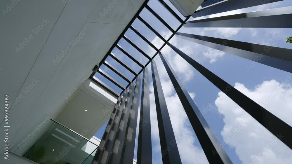 The contemporary modern architectural design features vertical slats ...