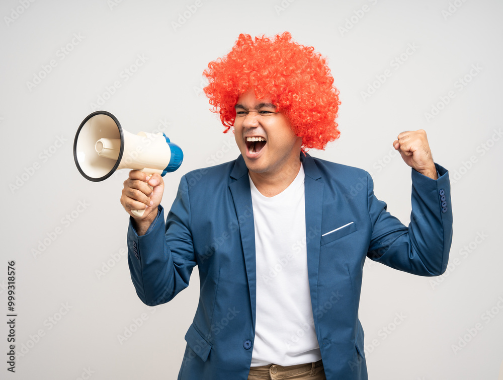 Shout out loud with megaphone. Young Asian man with afro Hairstyle ...
