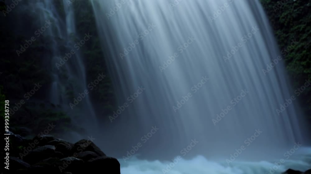 A rare phenomenon where moonlight creates a rainbow (moonbow) over a ...