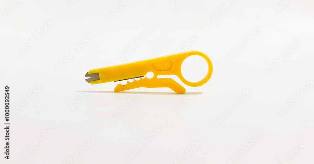 Yellow plastic wire stripper with ergonomic design, suitable for ...