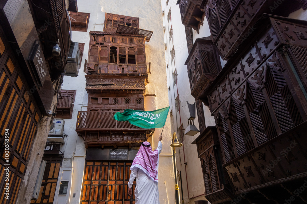 Jeddah, Makkah, Saudi Arabia September 23, 2024: A Saudi Citizen waving ...