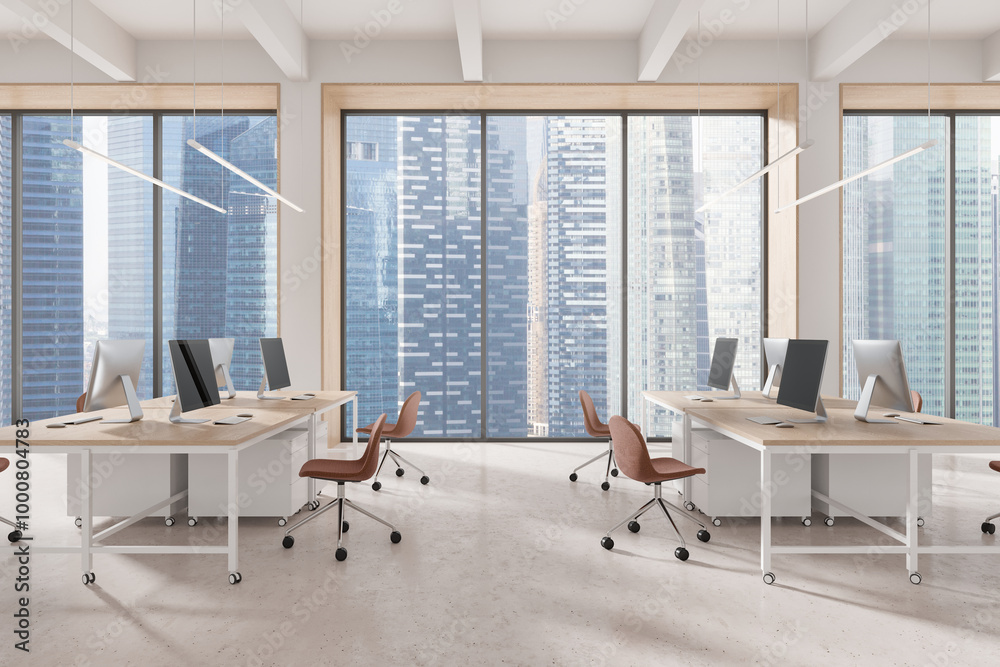 Modern open-space office interior with large windows showcasing a ...