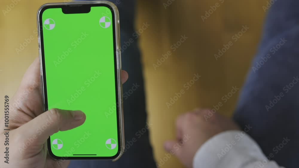 Scrolling pages and finger tapping on smartphone with green screen and ...