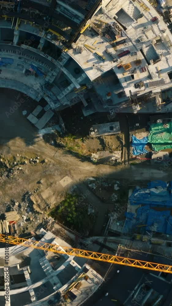 Vertical top view of construction of circular building. Stock footage ...