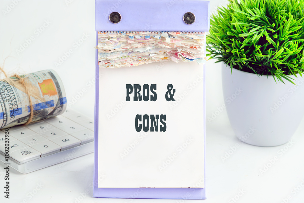PROS and CONS message on a desktop calendar on a light background Stock ...