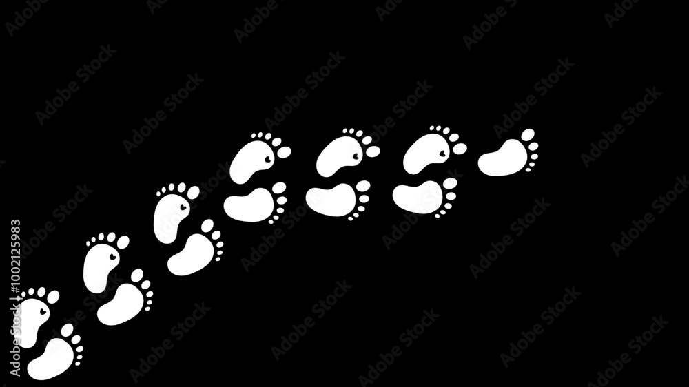 The footprints of a child's foot. A trail of baby footprints. Alpha ...