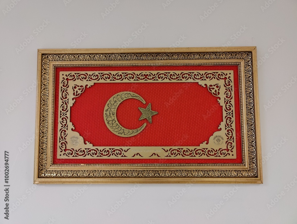 An ornate depiction of the Turkish crescent and star, framed in gold ...