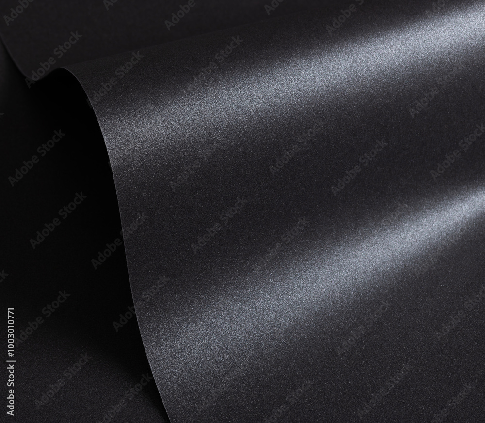 Black paper with a textured surface and minimalist, monochrome background. The premium structure ...