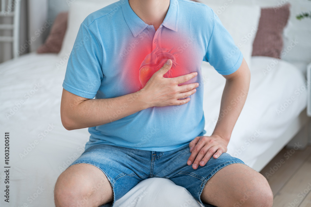 Heart attack, acute heartache, man suffering from chest pain at home ...