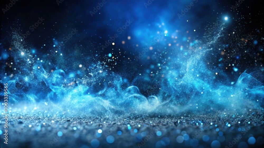 Shiny smoke and glitter fluid creating a magical mist with blue color ...