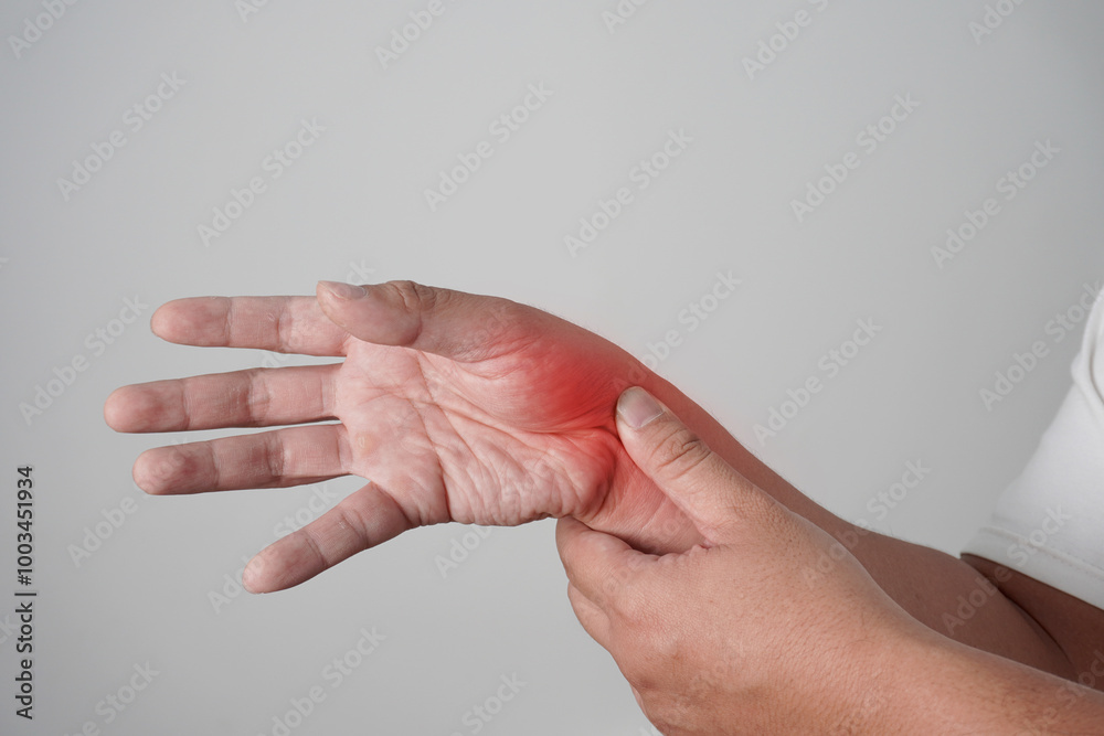 Male person with inflammation on hand wrist area, stiffness and pain in ...