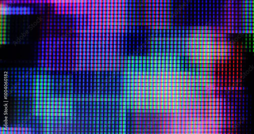 Extreme macro view of 4K LED matrix red, blue, and green sub-pixels ...