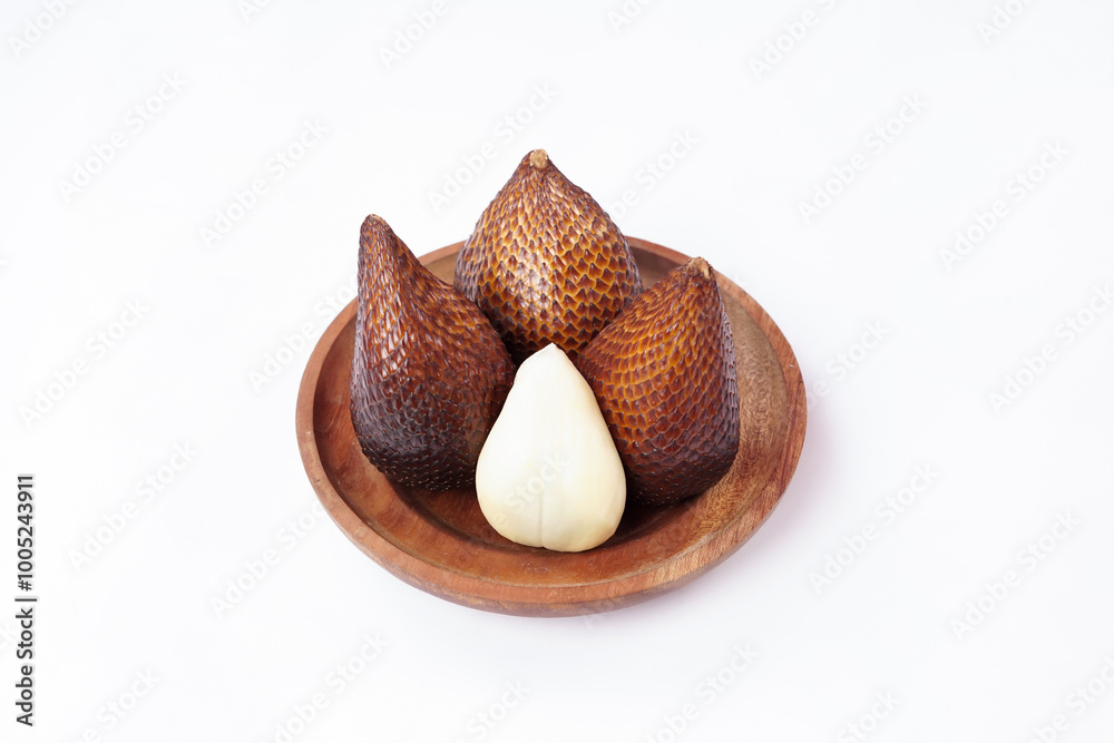 Snake fruit isolated on white background. one of which has its skin ...