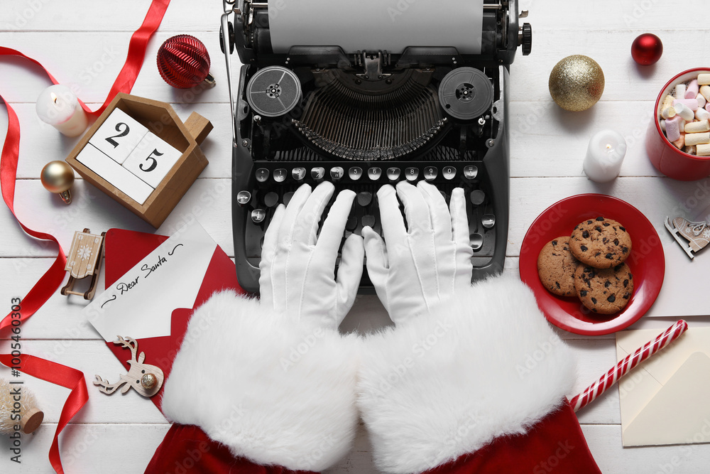 Santa Claus hands with Christmas cookies, cup of cacao and calendar ...