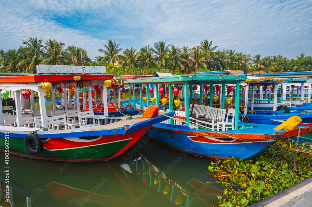 Traditional wooden Vietnamese boats on the Thu bon river in the old ...