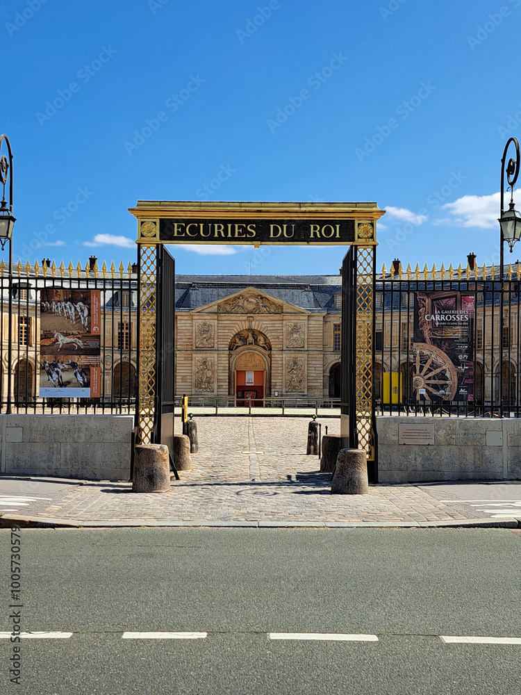 Palace of Versailles entrance door in exterior facade of chateau ...