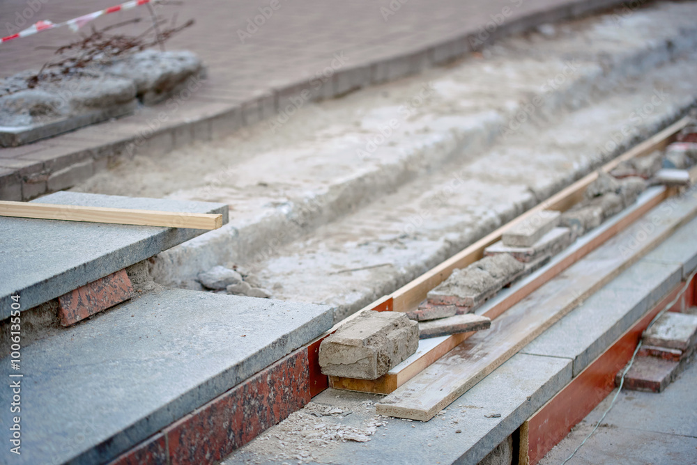 Repair work on granite stair steps, improvement process. Granite stair ...