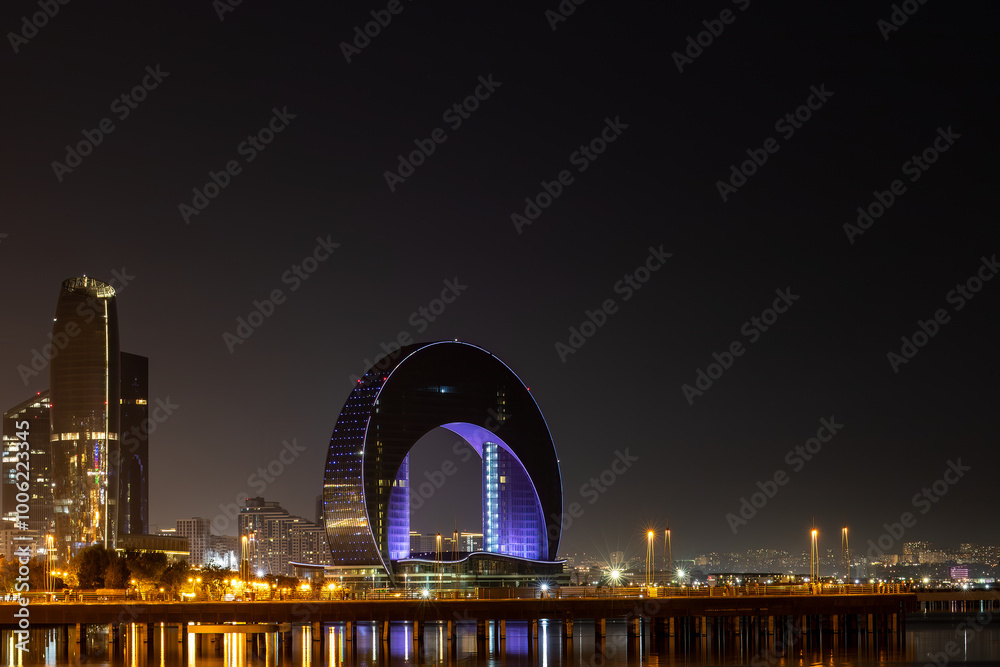 Baku, Azerbaijan A view at night of the Crescent Bay building on the ...