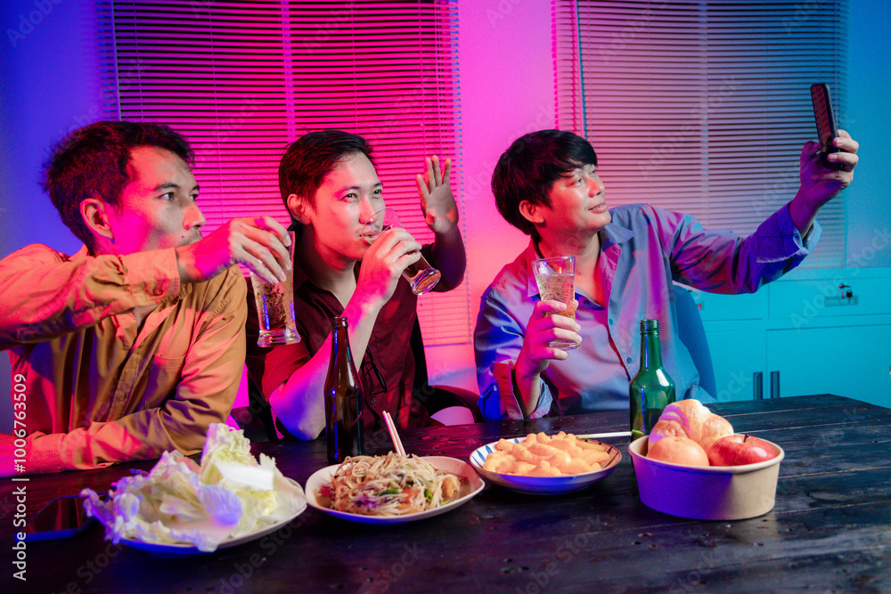 Happy group of asian friends or office colleagues drinking beer ...