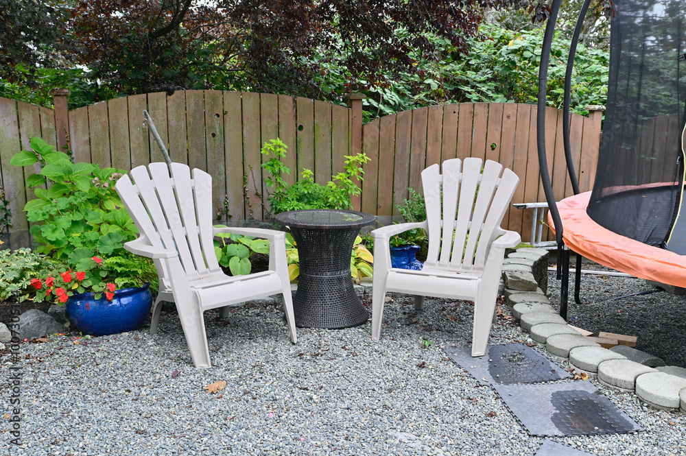 Backyard patio and garden space designed to share space for kids play ...