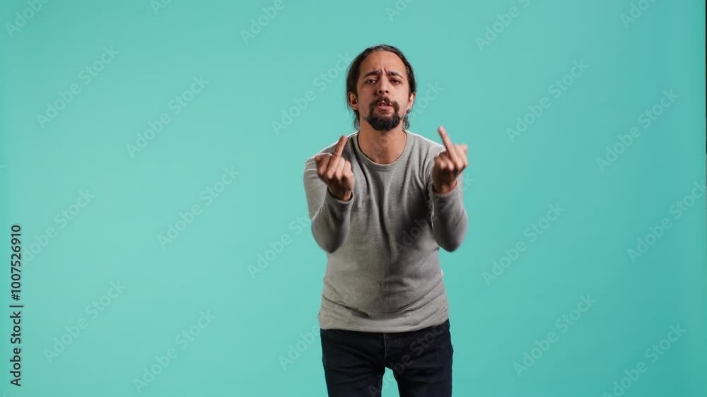 Irked man fighting with friend, doing middle finger sign gesturing ...