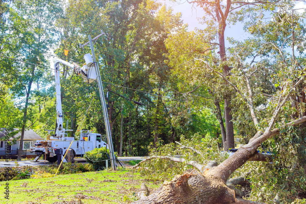 In aftermath of hurricane, emergency service lineman are diligently ...