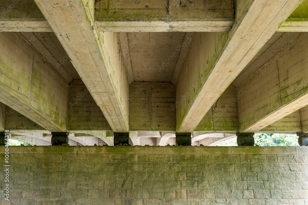 Beam and slab concrete road bridge seen from below. Standard precast ...