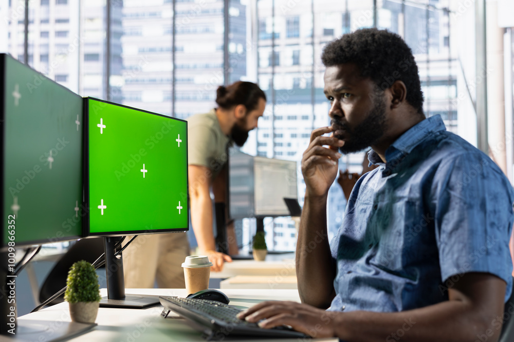 Man checking paperwork details on chroma key PC screen, solving tasks ...