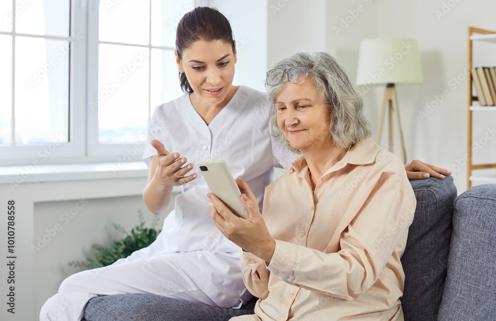 Supporting caring kind female medical nurse helping senior patient with ...