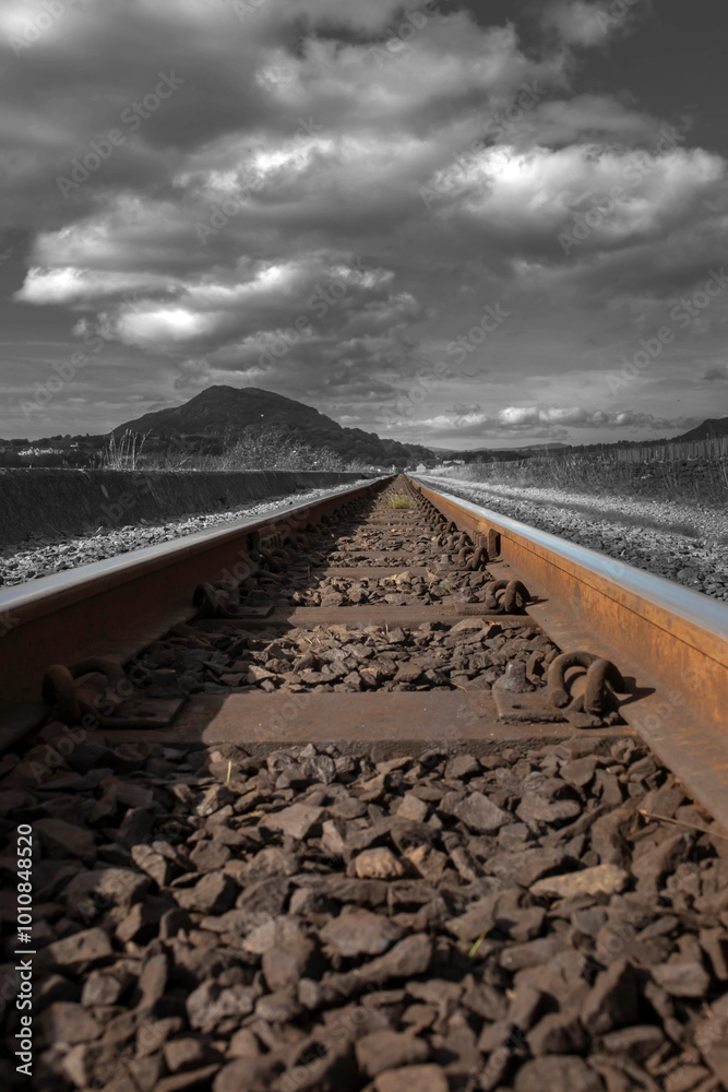 Narrow gauge railway train track on a restored vintage railway line in ...