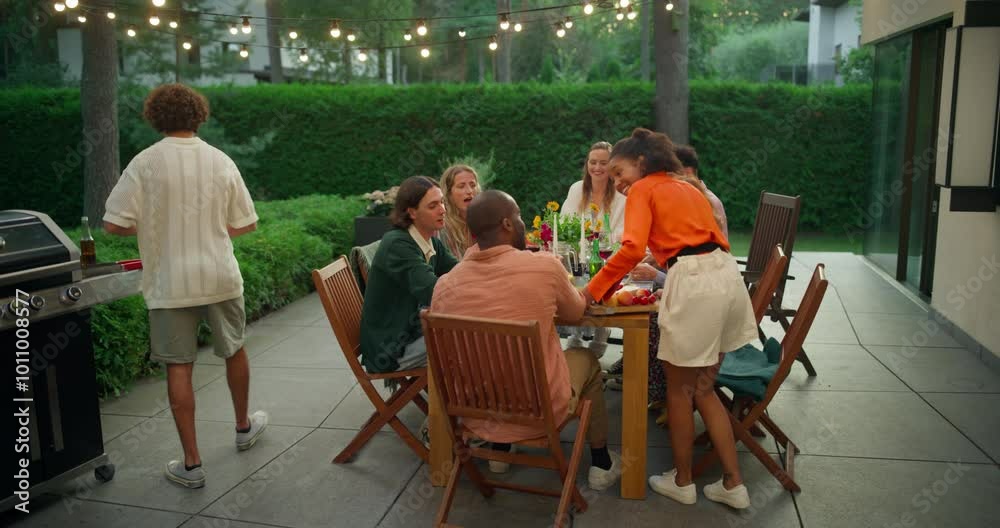 Group of Friends Having an Open Air Barbecue Dinner in Their Backyard ...