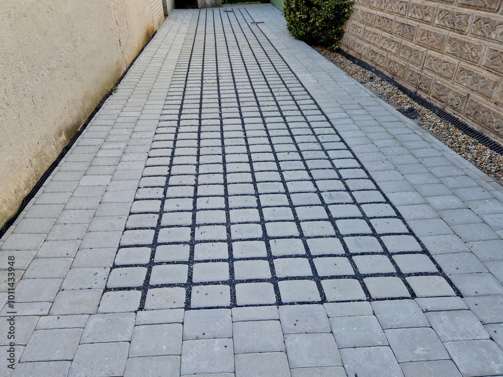 infiltration parking lot made of porous concrete tiles in a regular ...