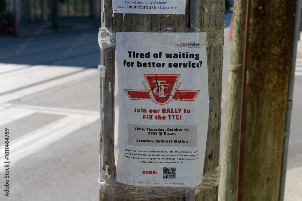 rally to fix the TTC bill posted on a pole along Queen Street East in ...