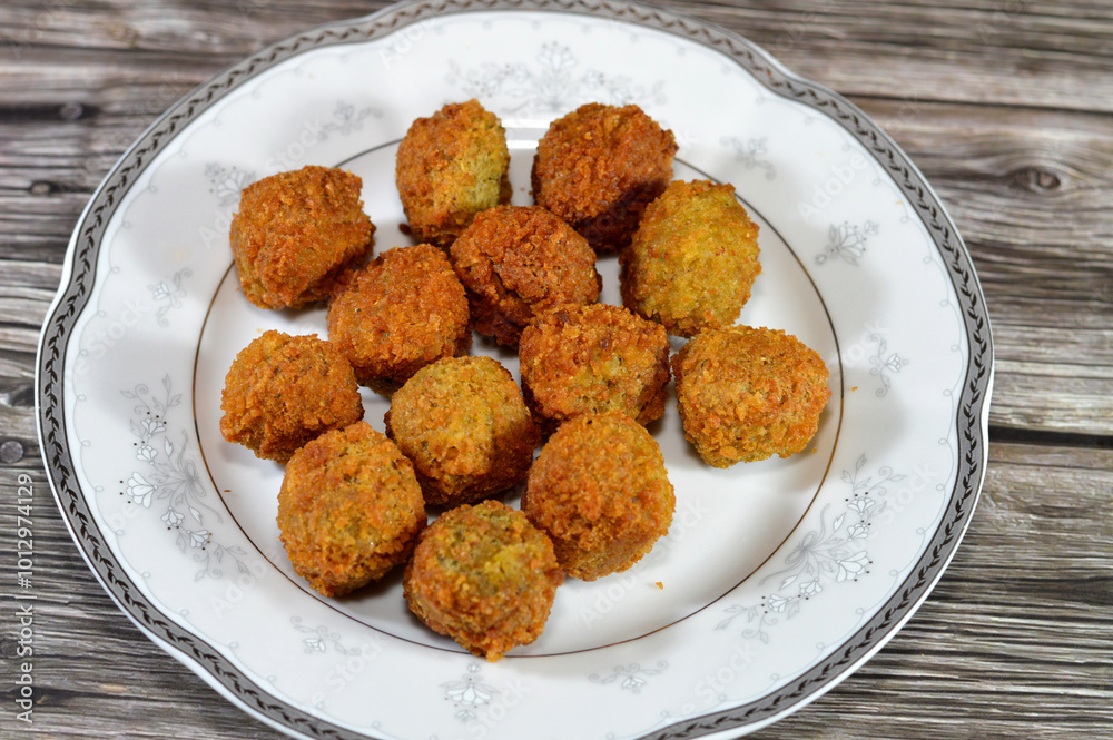 Fried chickpeas Falafel, a deep-fried ball or patty-shaped fritter of ...