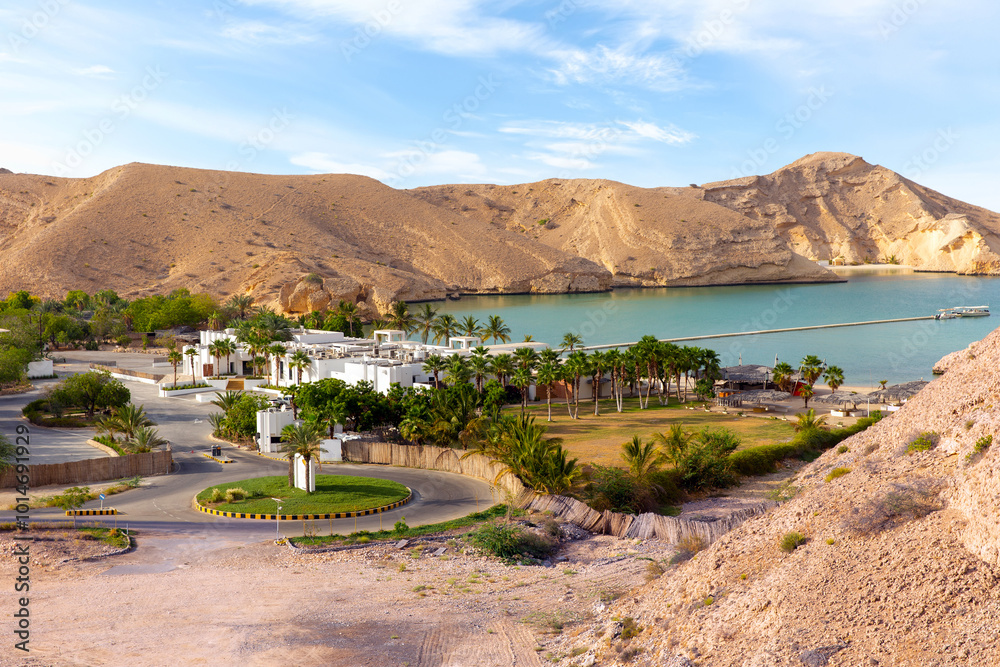 Aerial view of a luxury resort in a cozy bay of the Arabian Sea ...