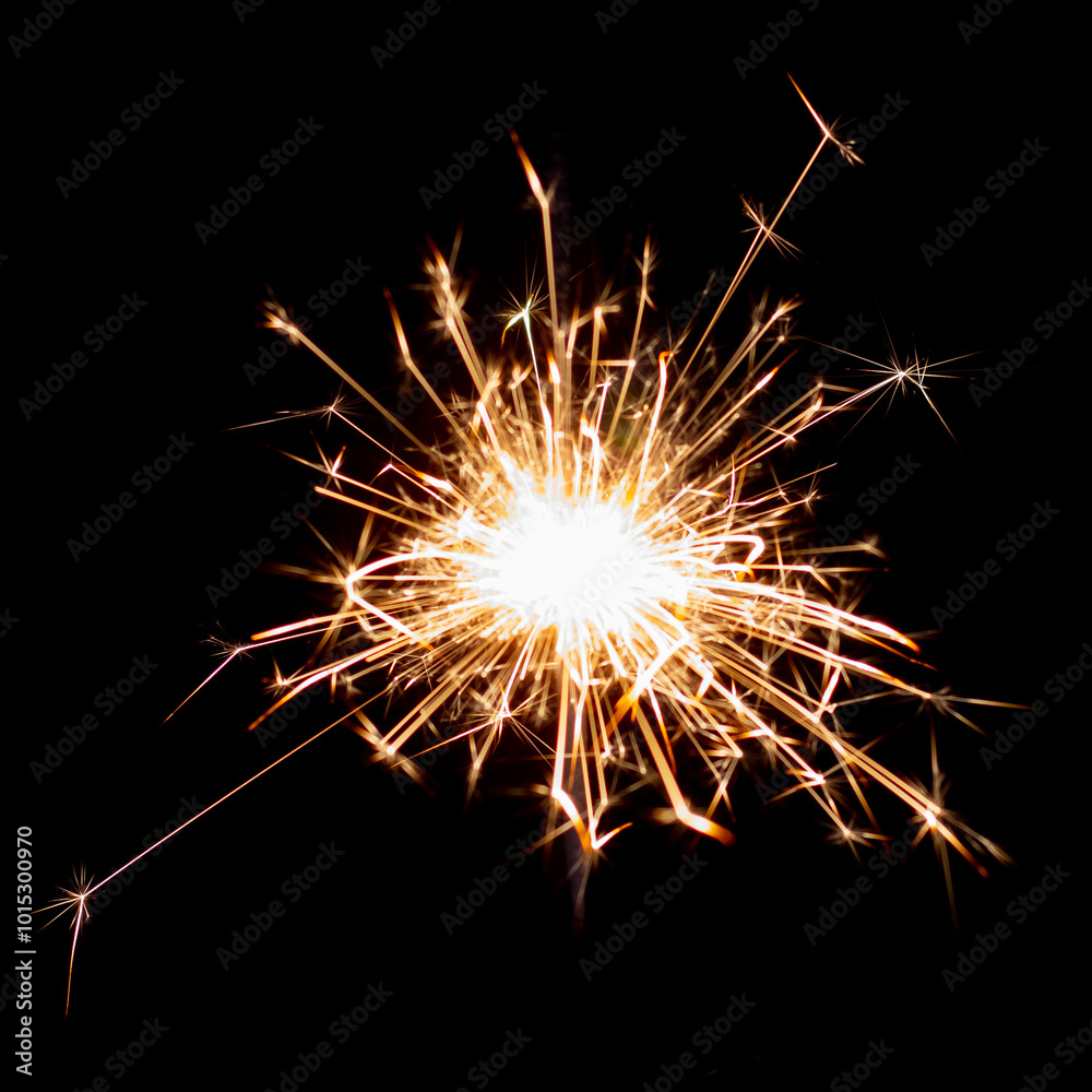 Sparklers on black isolated background. Sparks from a burning sparkler ...