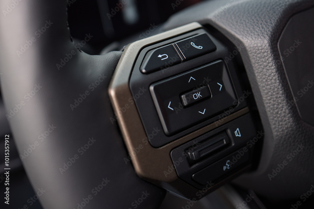 The modern cars steering wheel control panel boosts convenience and ...