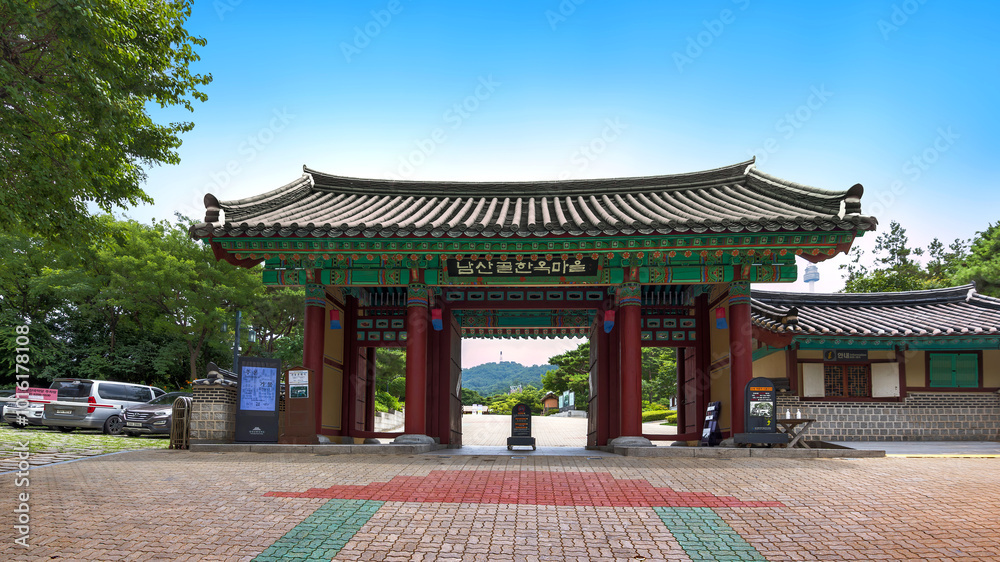 Traditional Korean gate marks the entrance to Namsangol Hanok Village ...