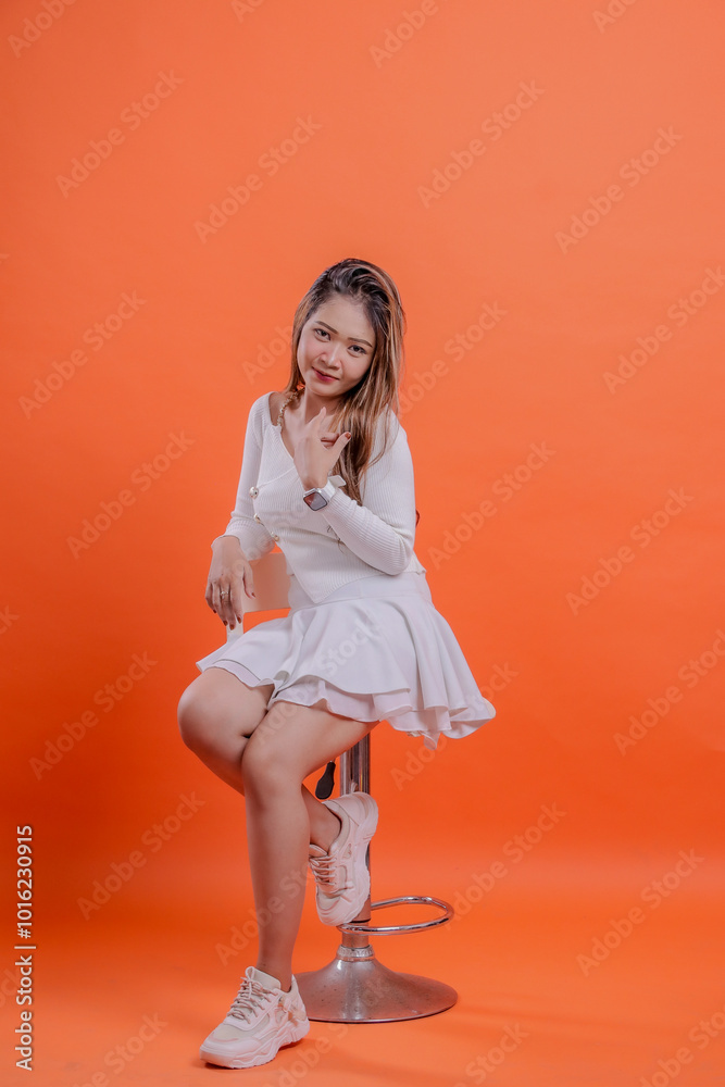 full length young woman white sweater seductive smile slanted right ...