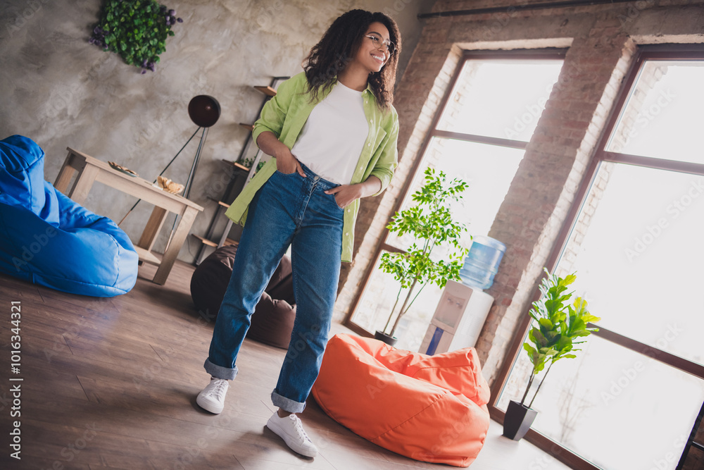 Full body portrait of young corporate lady brainstorming loft interior ...