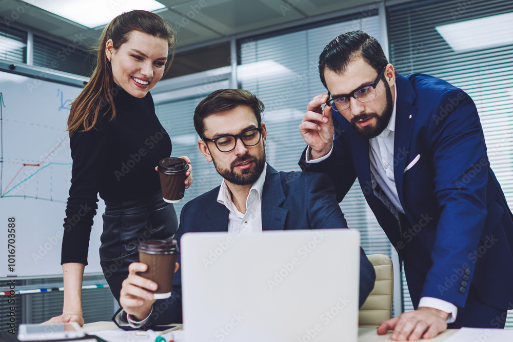 Happy formal business team drinking coffee and relaxing at work ...