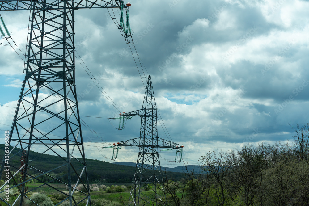 High voltage towers with sky background. Power line support with wires ...