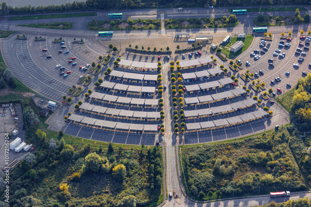 Aerial view of UK park and ride with solar roof panels, promoting ...