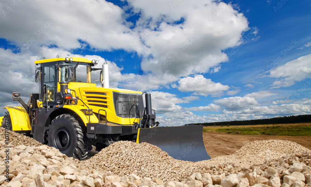 Bulldozer for construction work. Engineering equipment builds road in ...