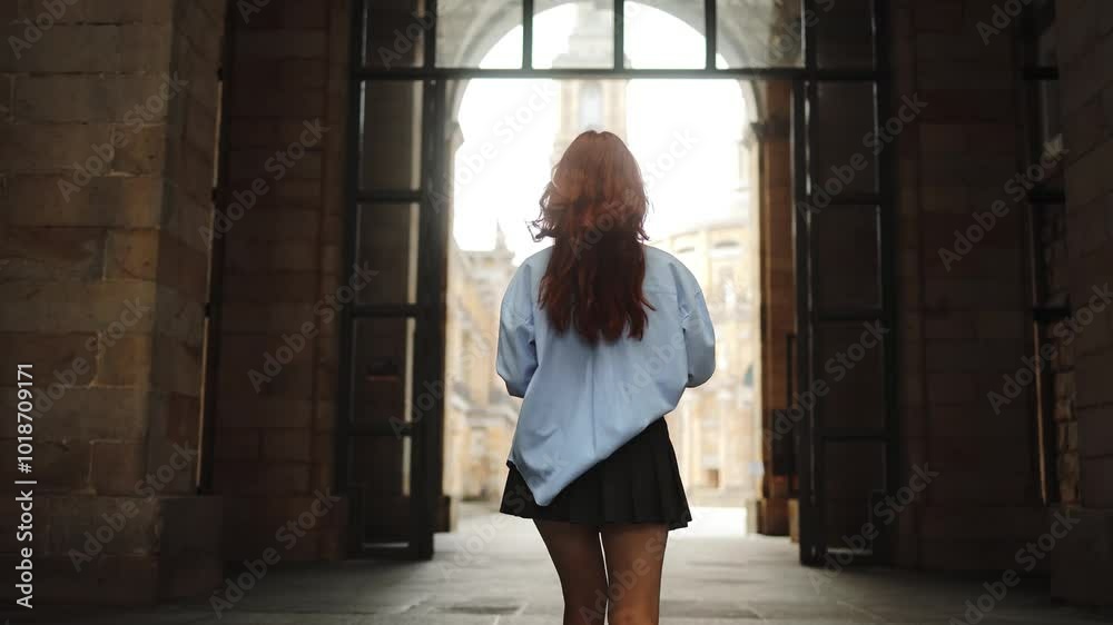 Beautiful girl student enters a bright future, university doors ...
