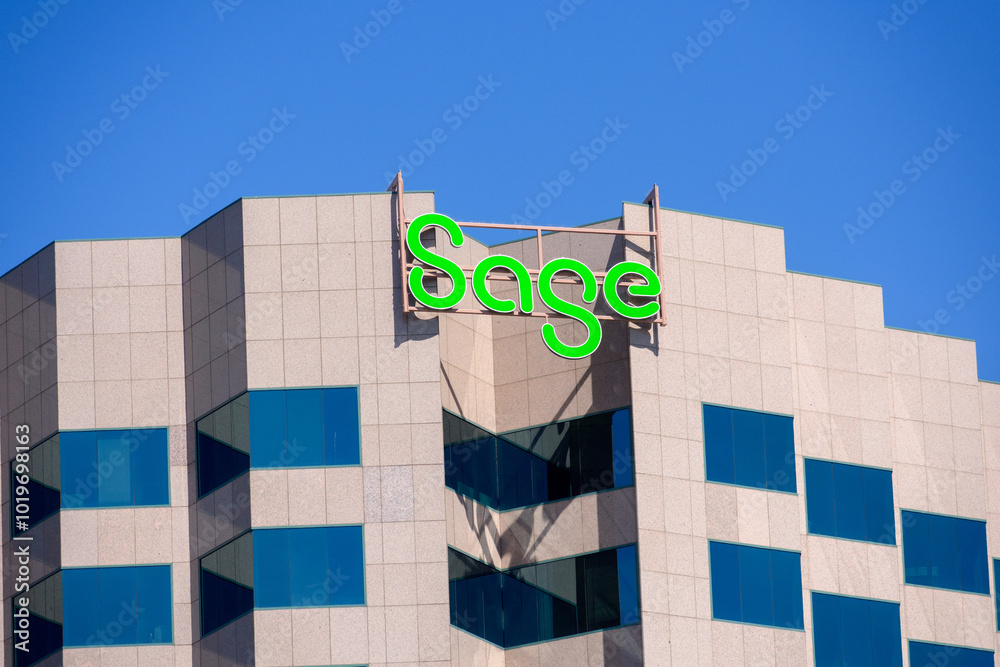 Sage sign, logo on the facade of corporate headquarters building of ...