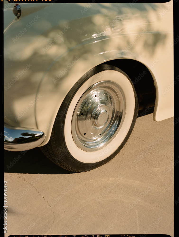 Analog film of the white face wheel of a classic car Stock Photo ...