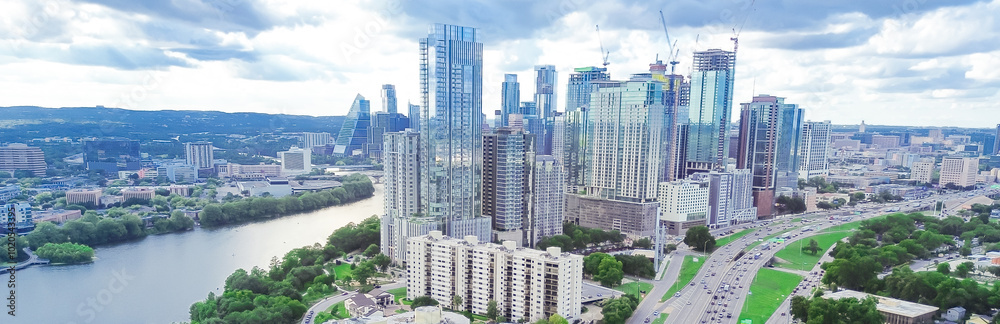 Panorama aerial view Austin Downtown skyscrapers along lush green ...
