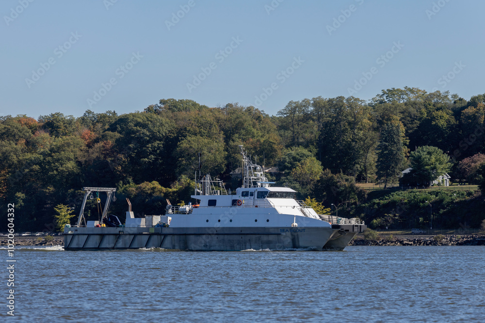 Cable laying boats on Hudson River below Kingston, NY working as part ...